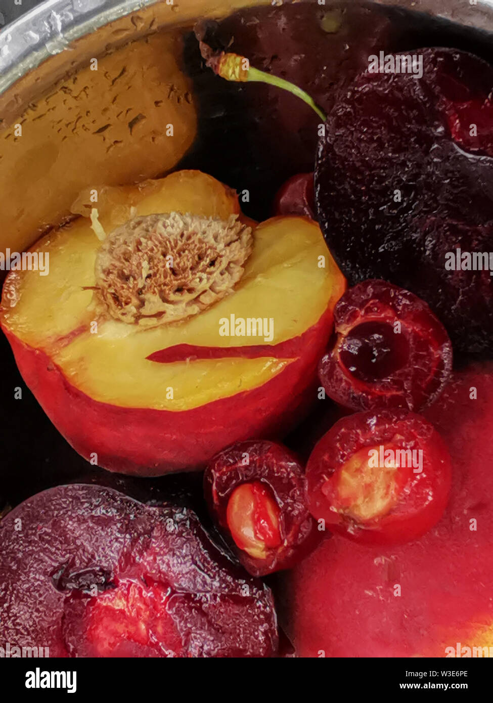Fresh ripe summer berries and fruits, peaches, apricots, cherry and ...