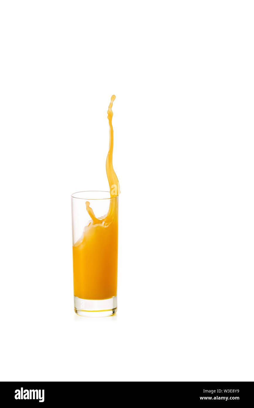 splash of orange juice in glass isolated on white background Stock ...