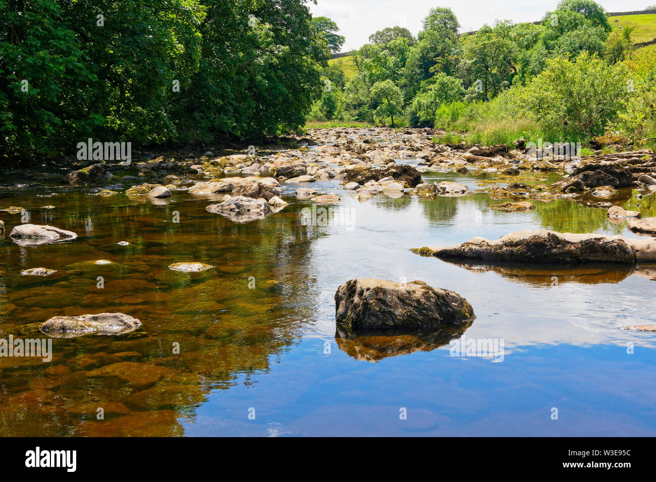 Rocks and boulders of all sizes litter the River Ribble near Stainforth ...