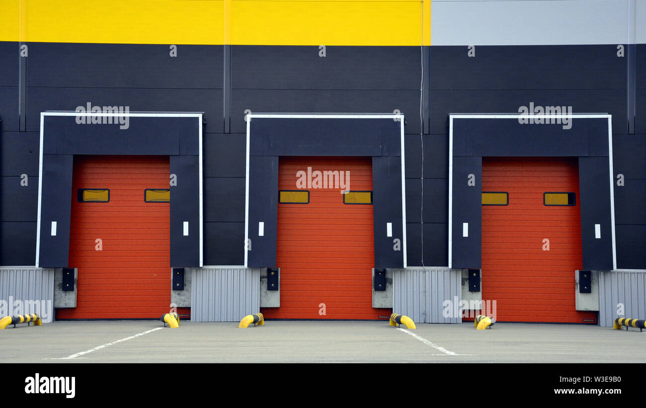 A Large distribution warehouse with gates for loading goods Stock Photo ...