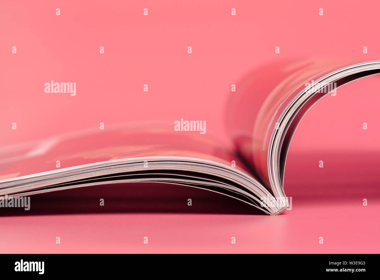 magazines on a pink background Stock Photo - Alamy