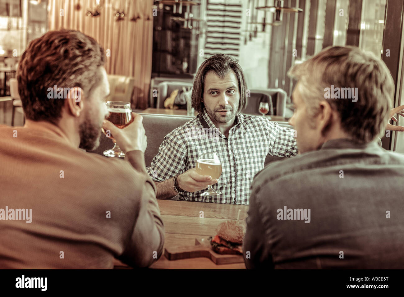 Three men after work hi-res stock photography and images - Alamy