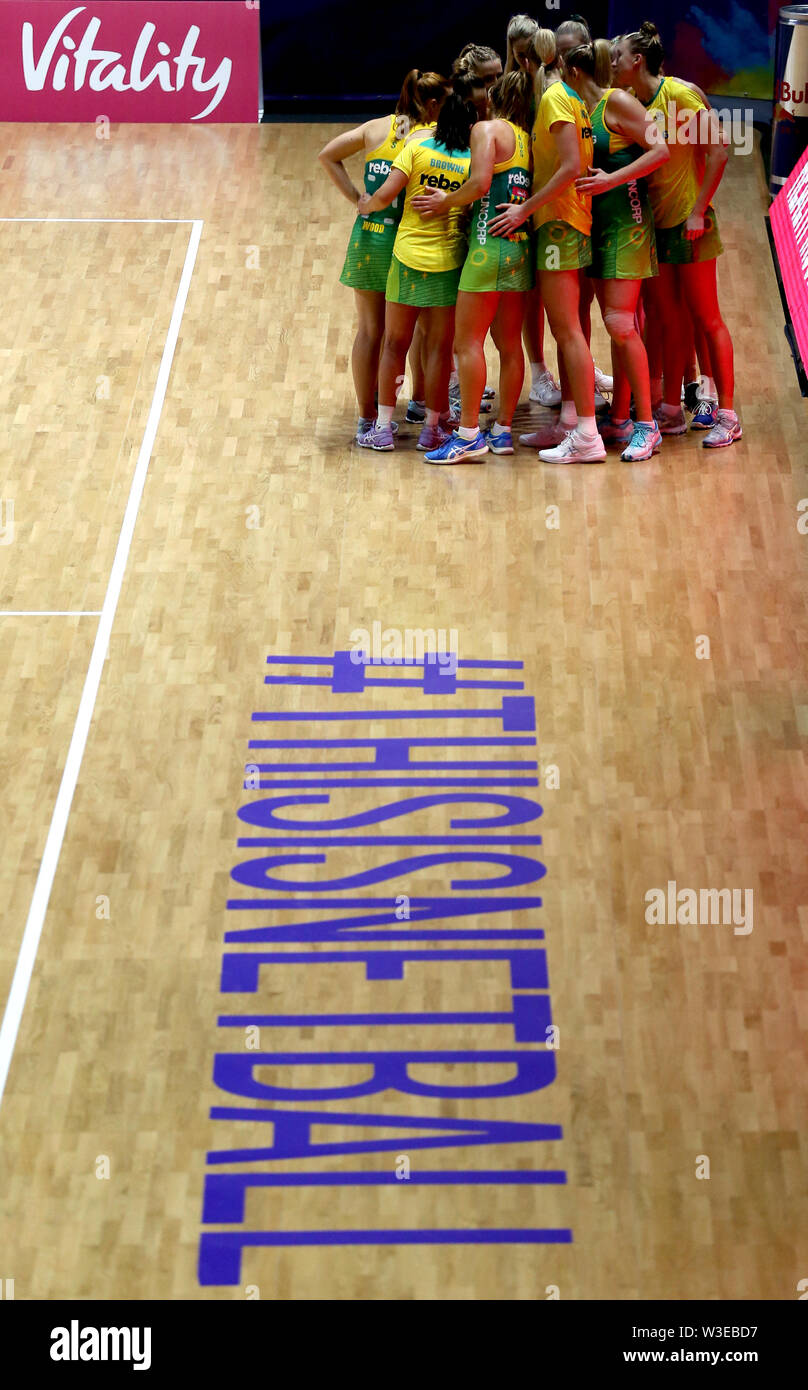 Australia players huddle together during the netball World Cup match at ...