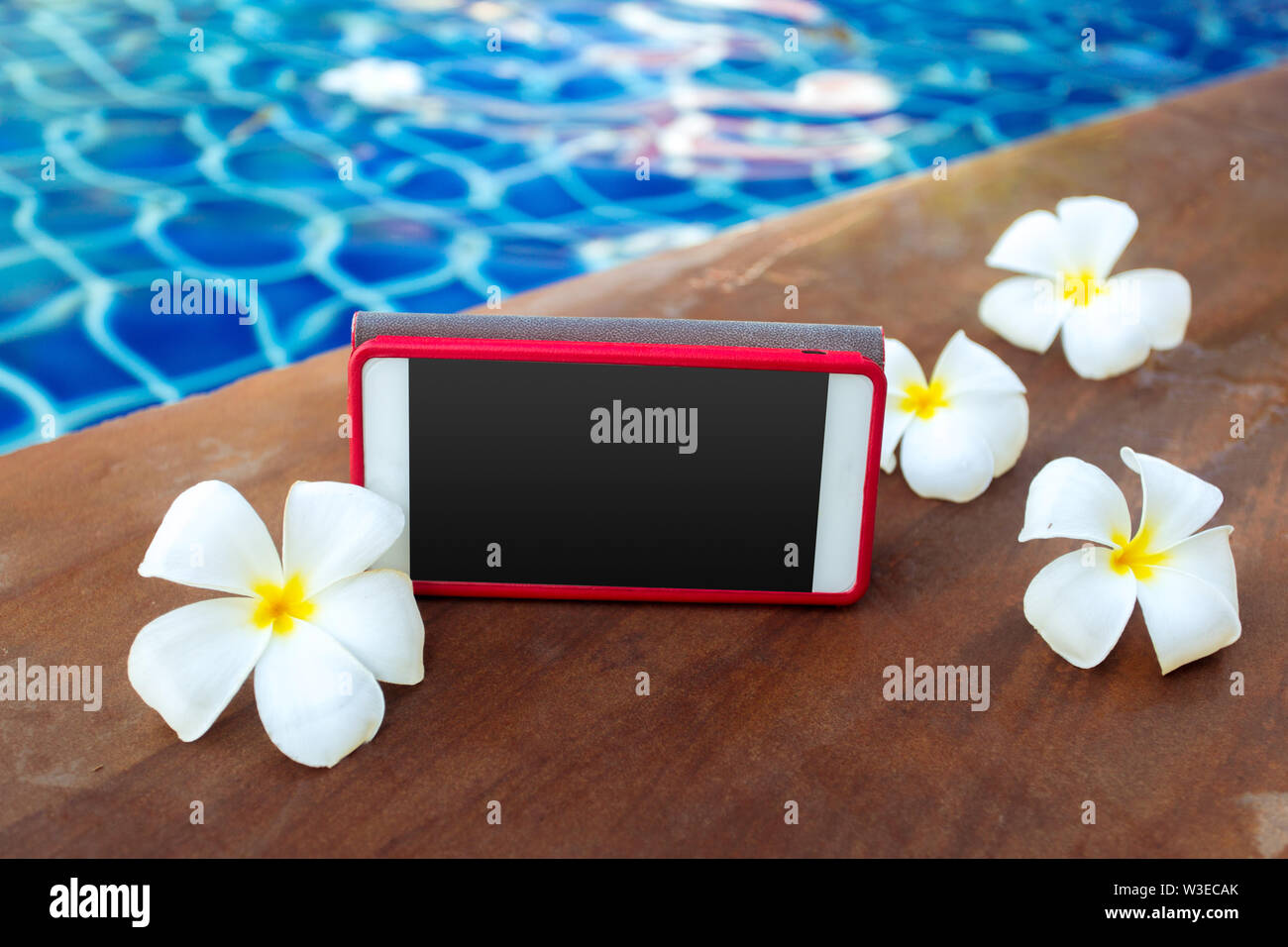 Smartphone with black screen near pool. Vacation concept Stock Photo ...