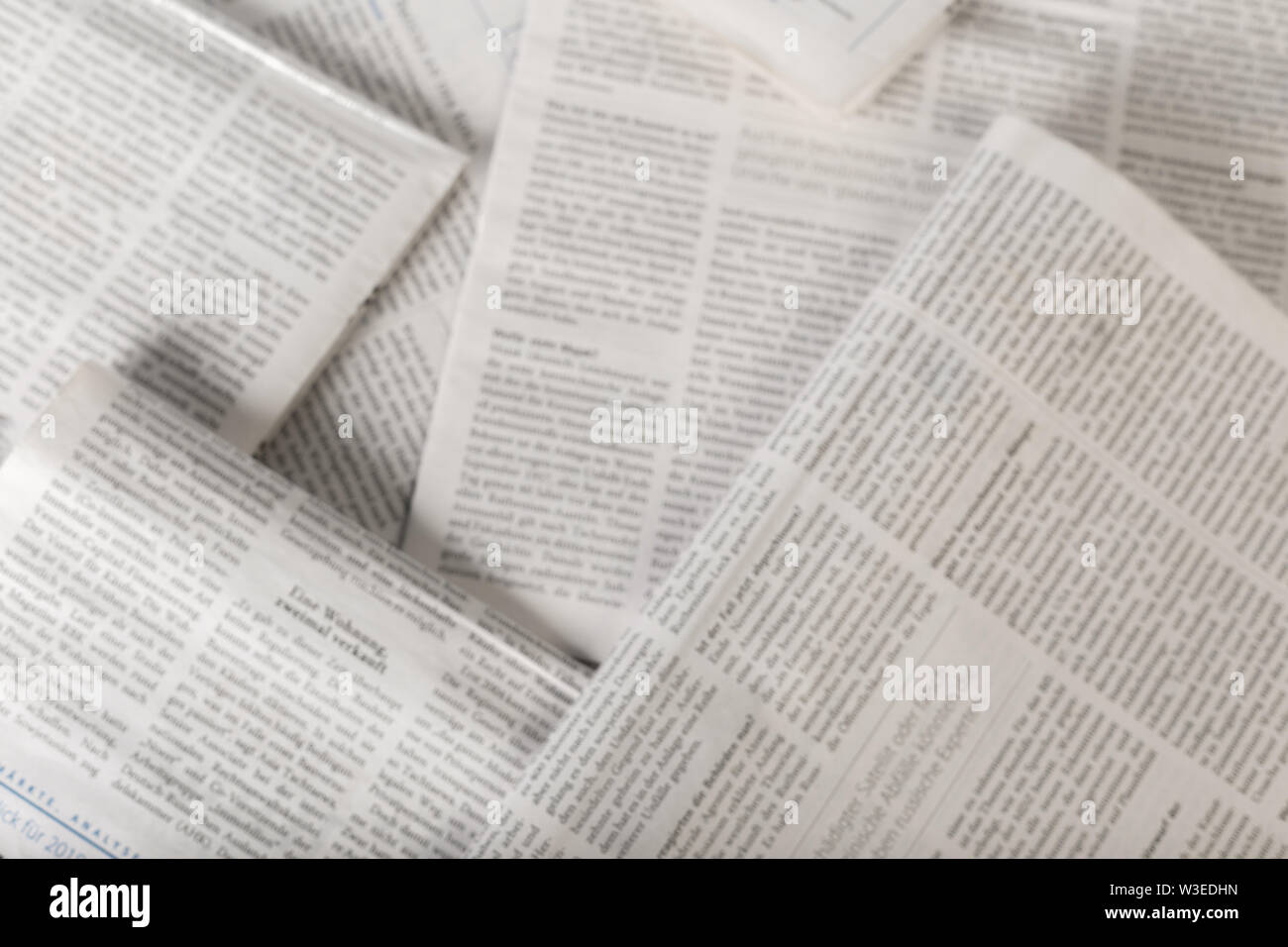 newspaper background, top view Stock Photo - Alamy