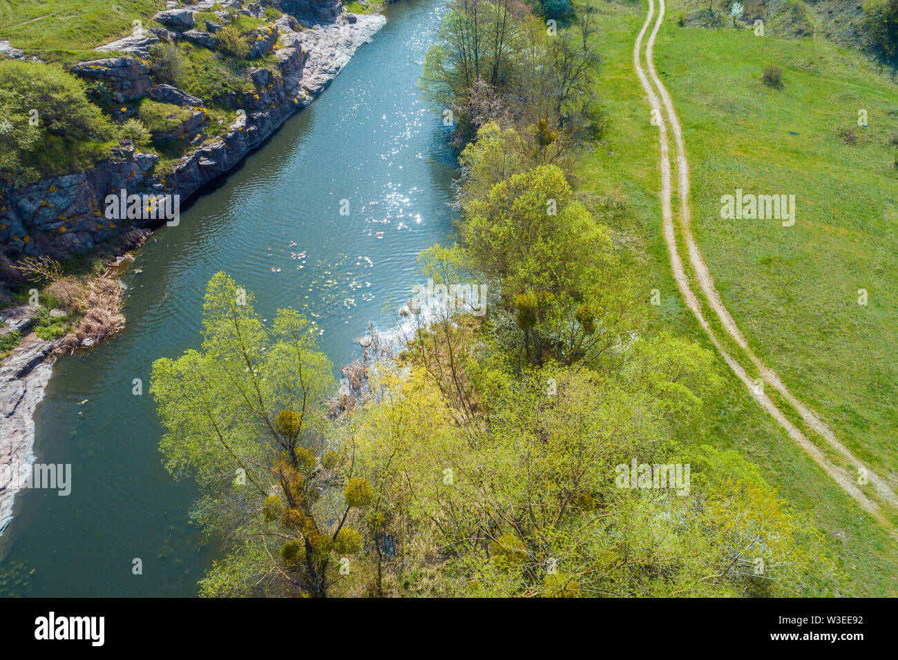 Beautiful landscape with a mountain river. The canyon in early spring ...