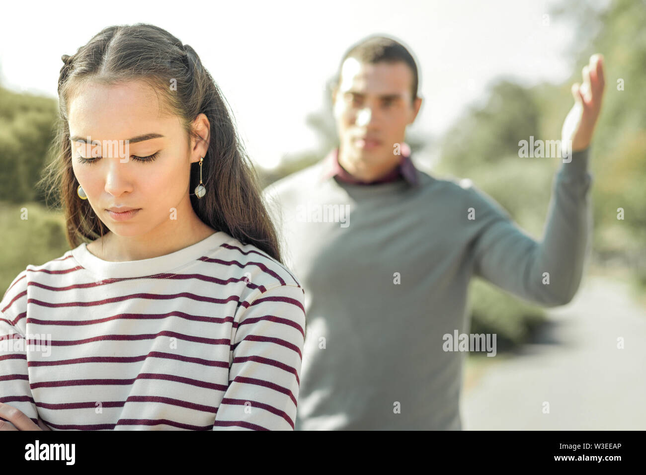 Angry man actively gesturing while arguing with girlfriend Stock Photo ...