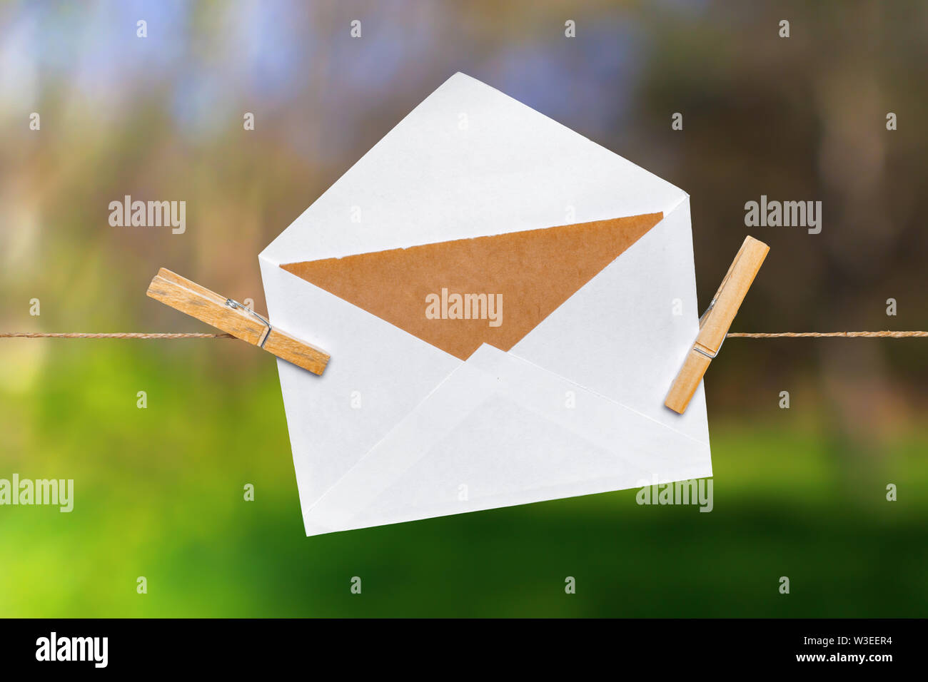 paper on a rope Stock Photo - Alamy