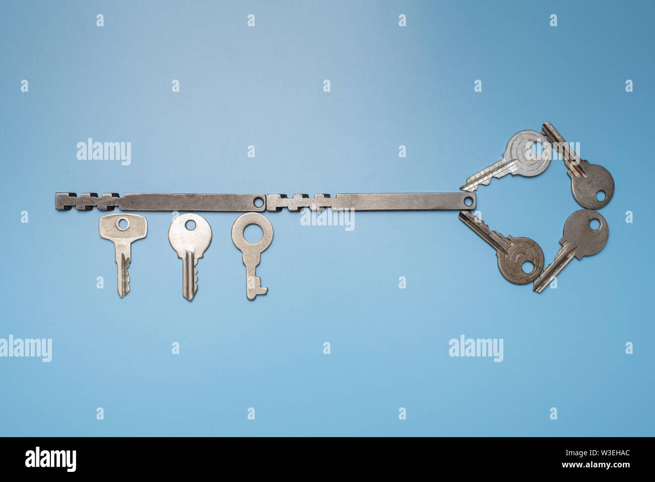 Bunch of keys in shape of big key concept. Different antique and new ...