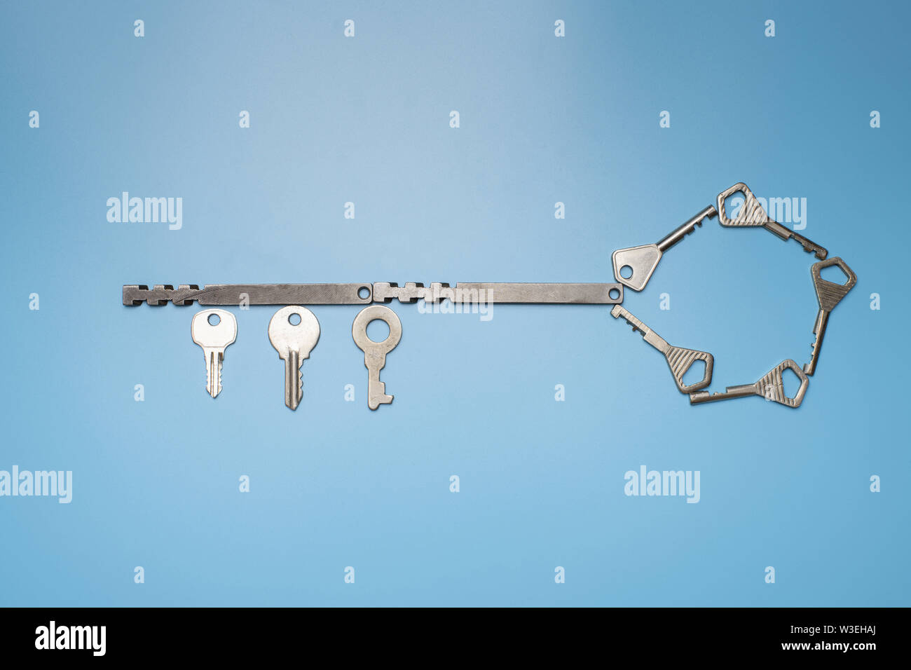 Bunch of keys in shape of big key concept. Different antique and new ...