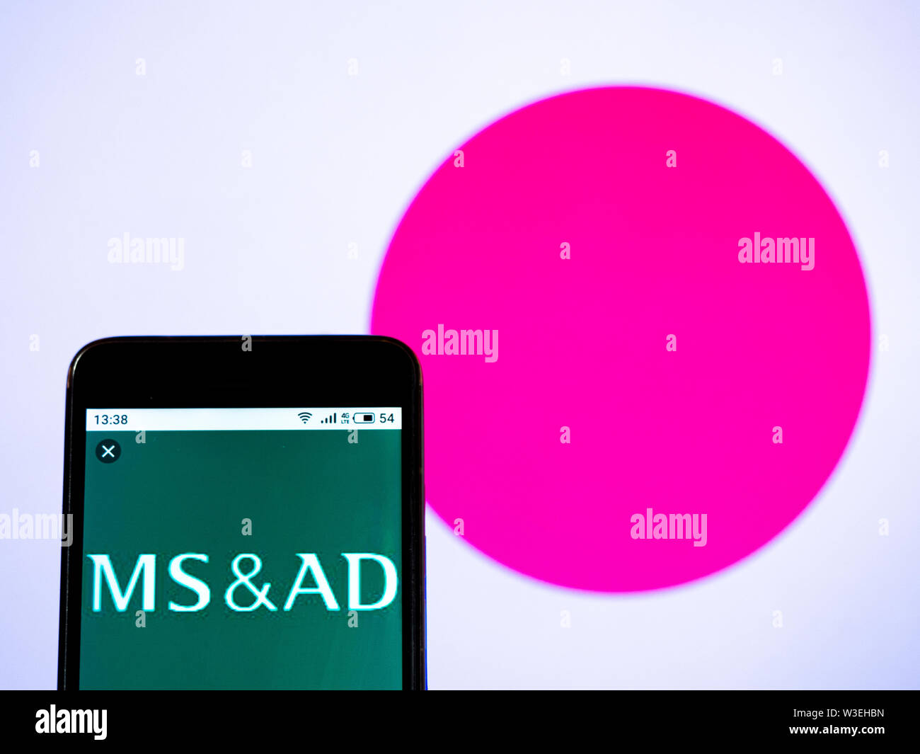 In this photo illustration the MS&AD Insurance Group logo is seen displayed on a smartphone ...