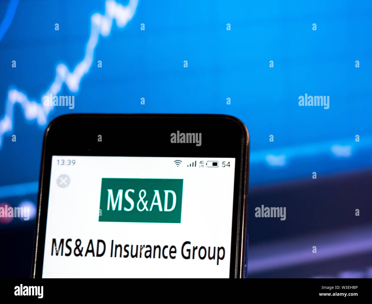 In this photo illustration the MS&AD Insurance Group logo is seen displayed on a smartphone ...