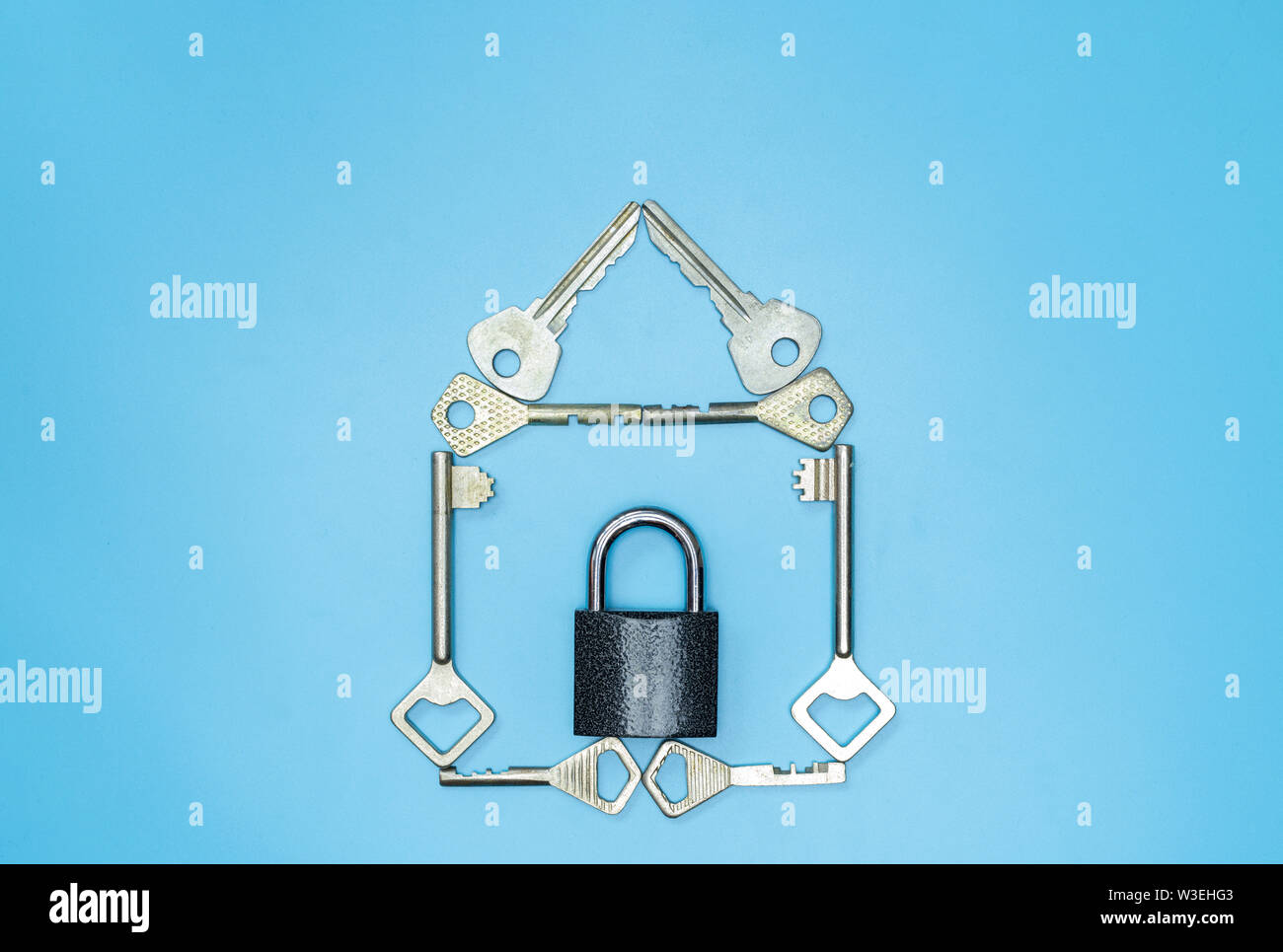 Keys set in house shape. Home security and protection of real estate ...