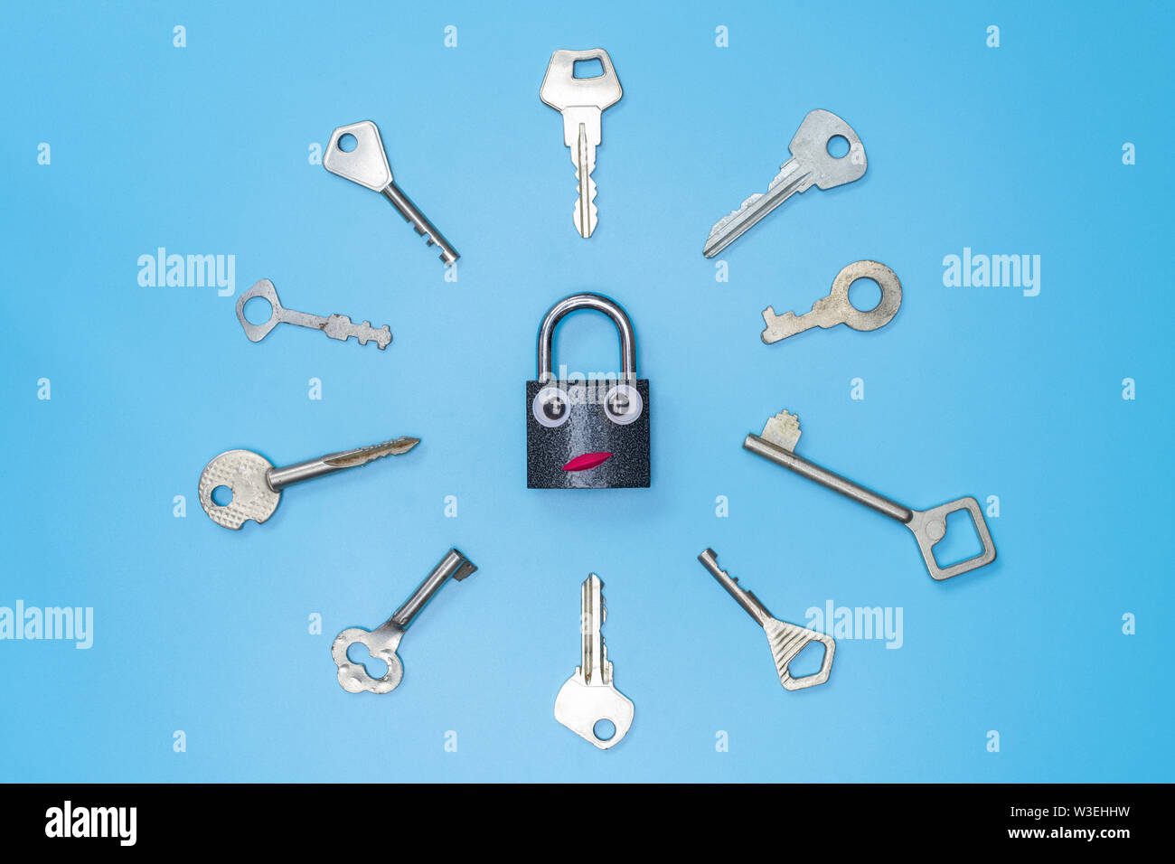 Keys set with funny lock concept, blue background. Choosing the best ...