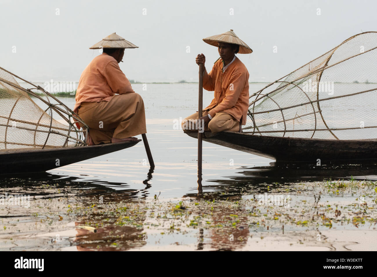 Man rowing a boat sunrise hi-res stock photography and images - Alamy