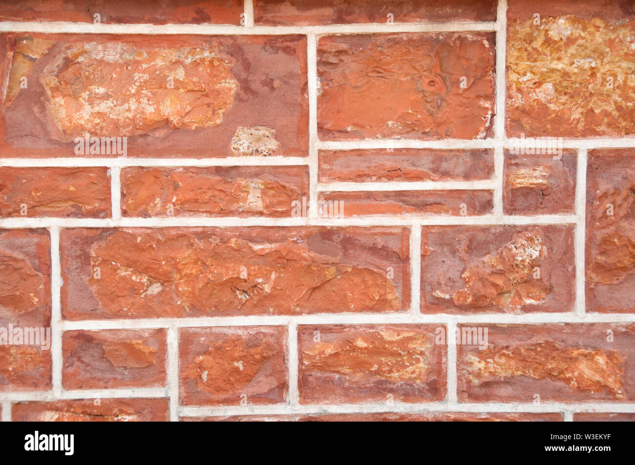 Neat, new, red brick wall with different brick sizes Stock Photo - Alamy