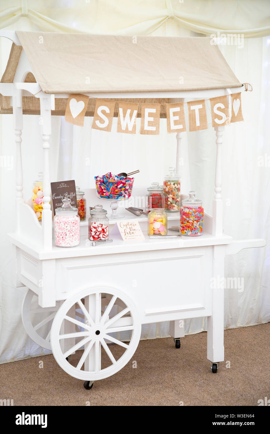 A sweet cart in situ at a wedding Stock Photo - Alamy