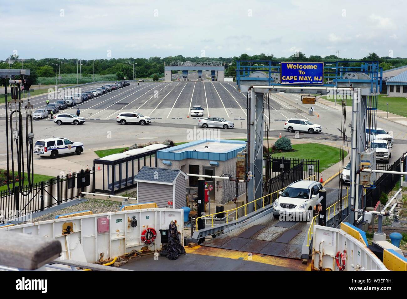 Vehicles load onto the deck of the Cape May-Lewes Ferry at the Cape May ...