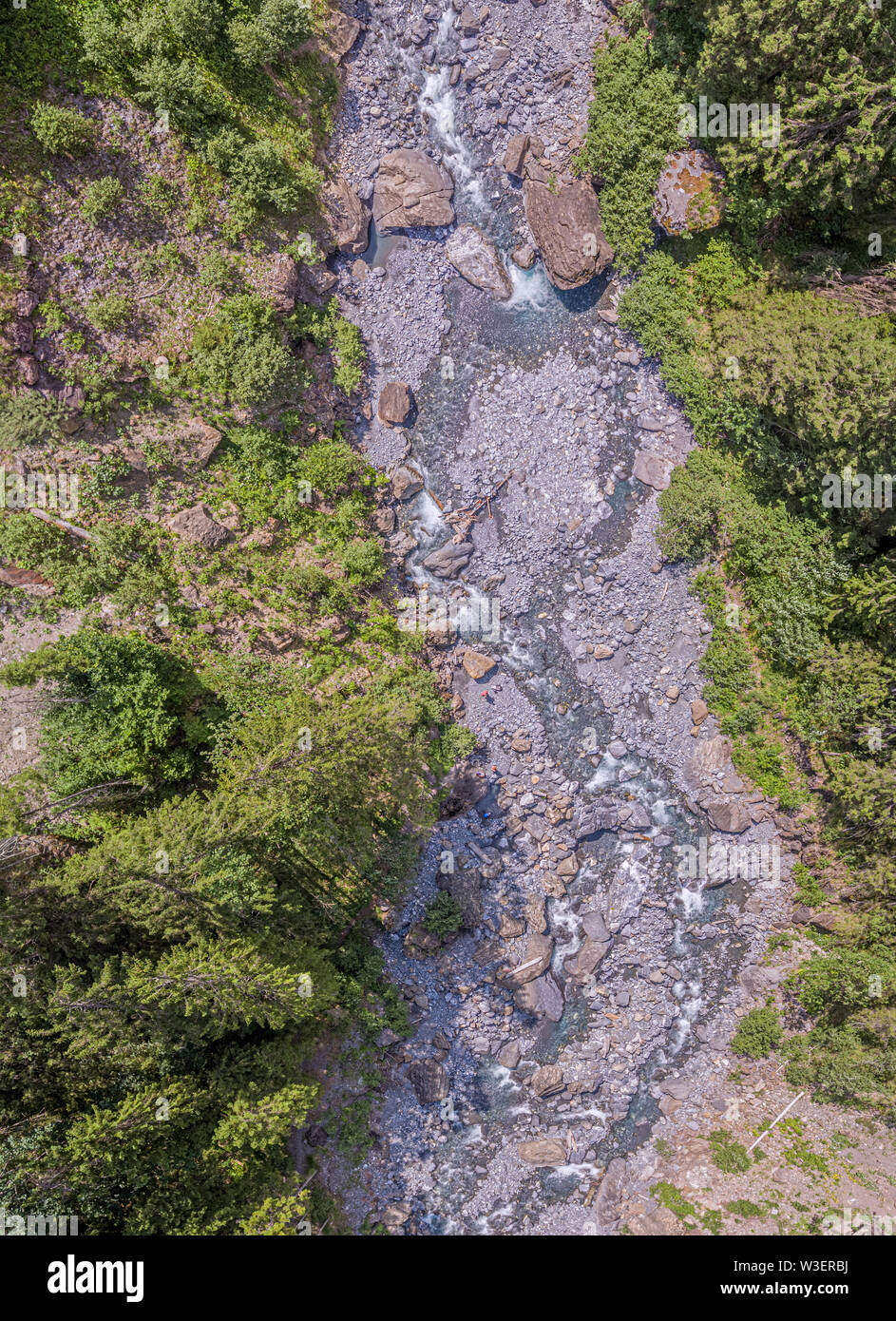 Over head drone view of a glacier melt alpine river valley Stock Photo ...