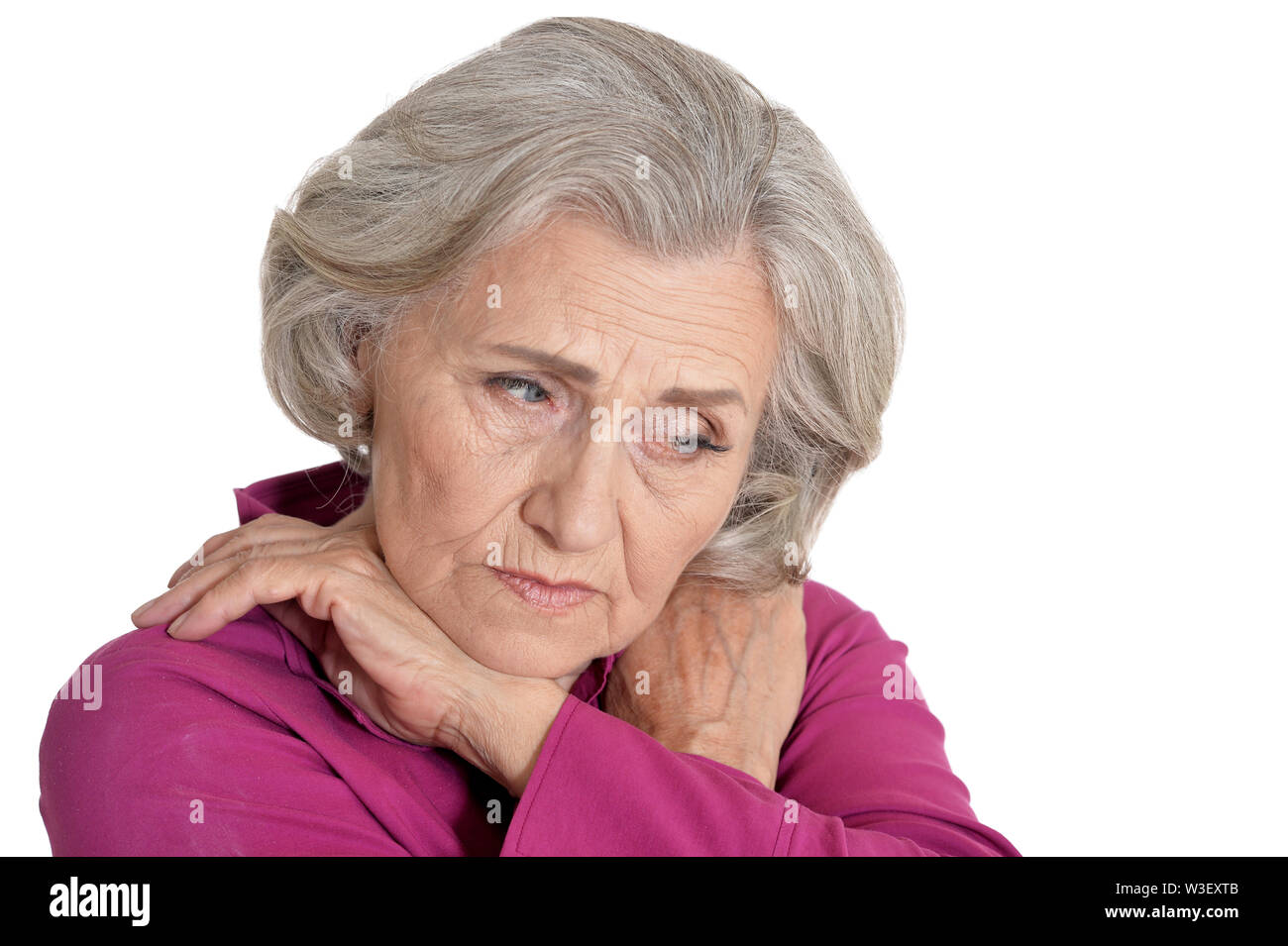 Portrait of sad senior woman posing isolated Stock Photo - Alamy
