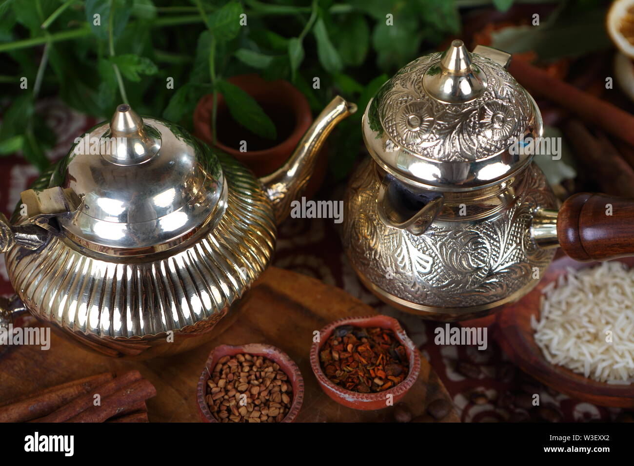 Iron teapot and coffee maker on the table with Indian spices Stock ...