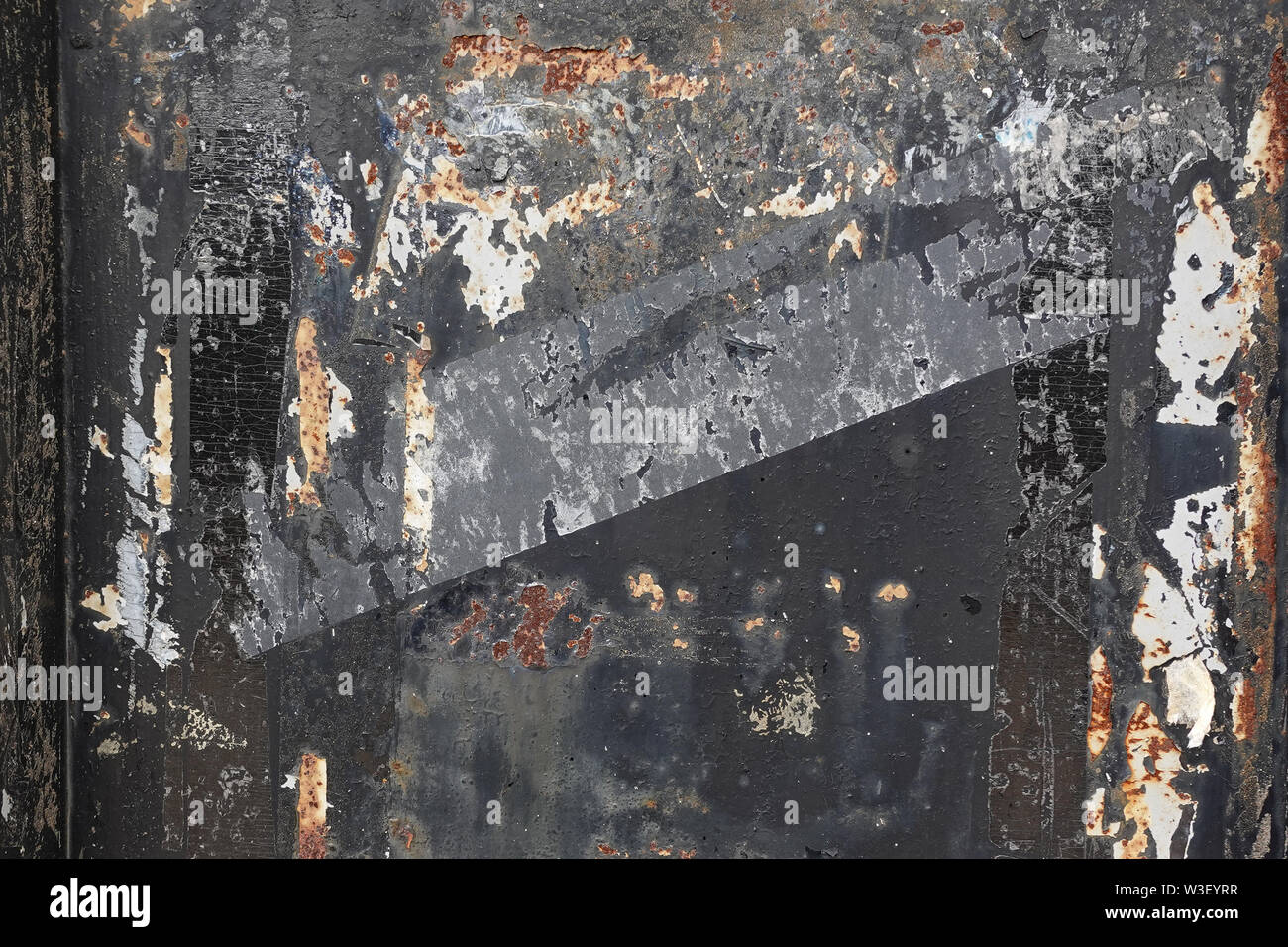 Rusty stained metal texture with chipped black paint. Abstract ...