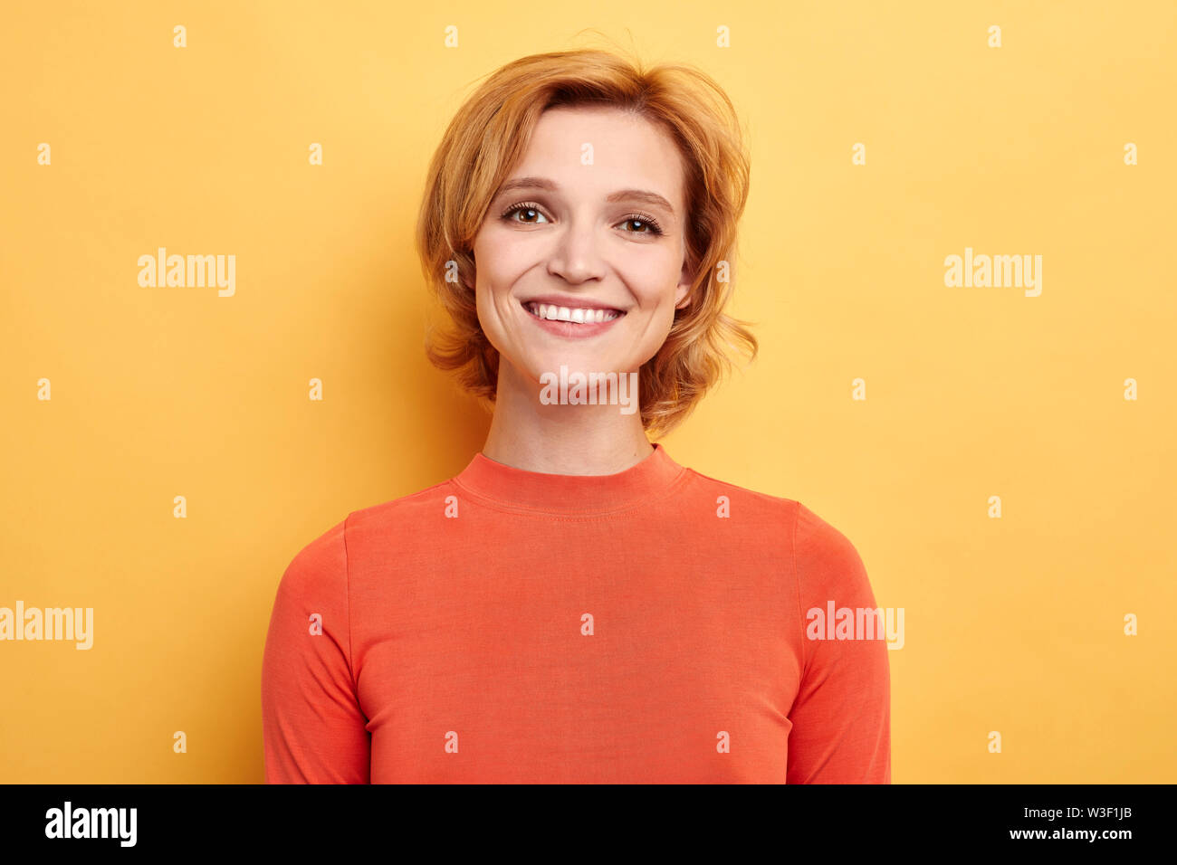 Close Up Portrait Of Young Beautiful Cute Positive Girl Smiling Looking