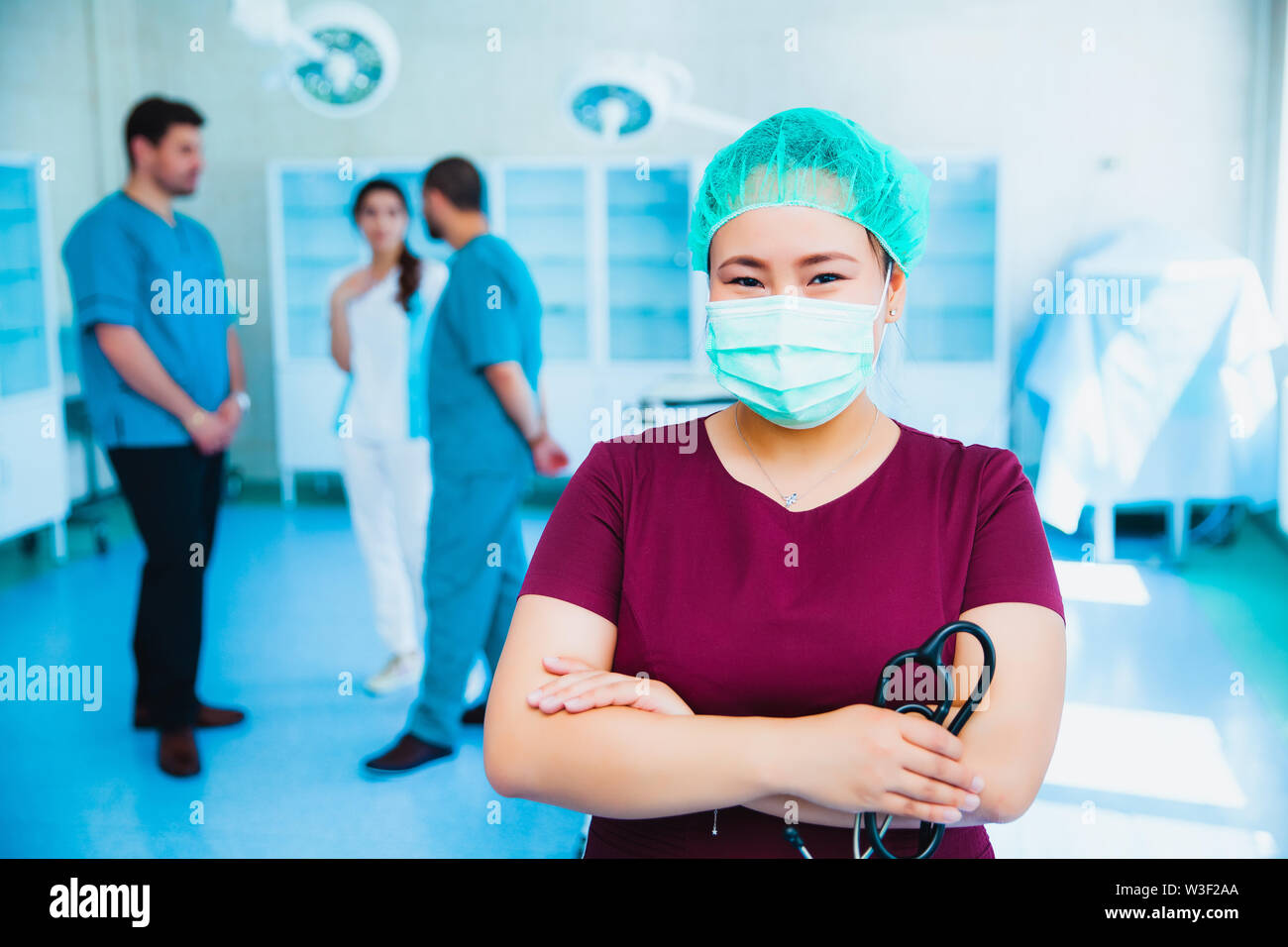 Portrait beautiful girl professional surgeon doctor. Staff of the ...