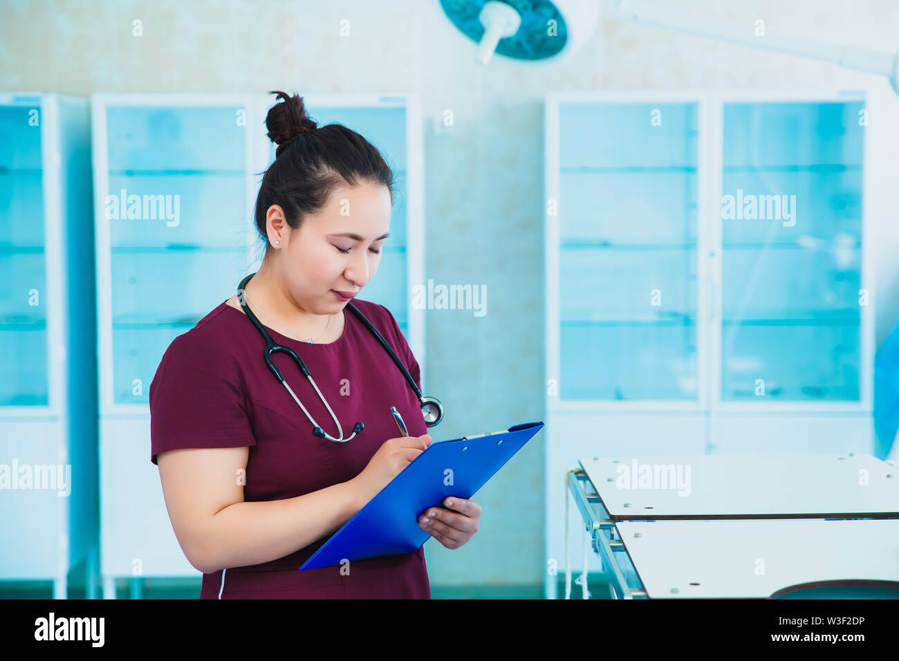 Portrait beautiful girl professional surgeon doctor. Staff of the ...