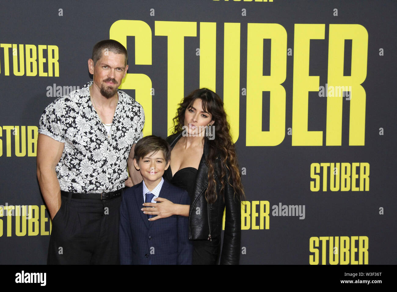 Steve Howey, William Wolf Howey and Sarah Shahi at the 20th Century Fox ...