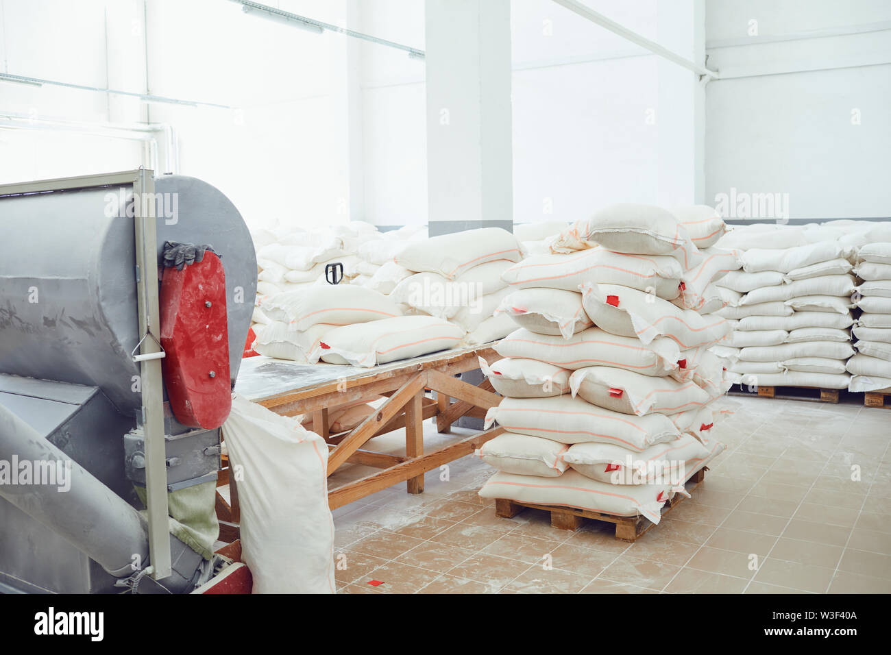 Bags of flour in the warehouse of the factory Stock Photo - Alamy
