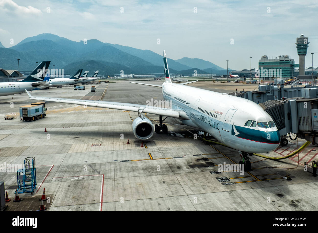 Lantau, Hong Kong - August 26, 2018 : Airplane dock with passenger ...