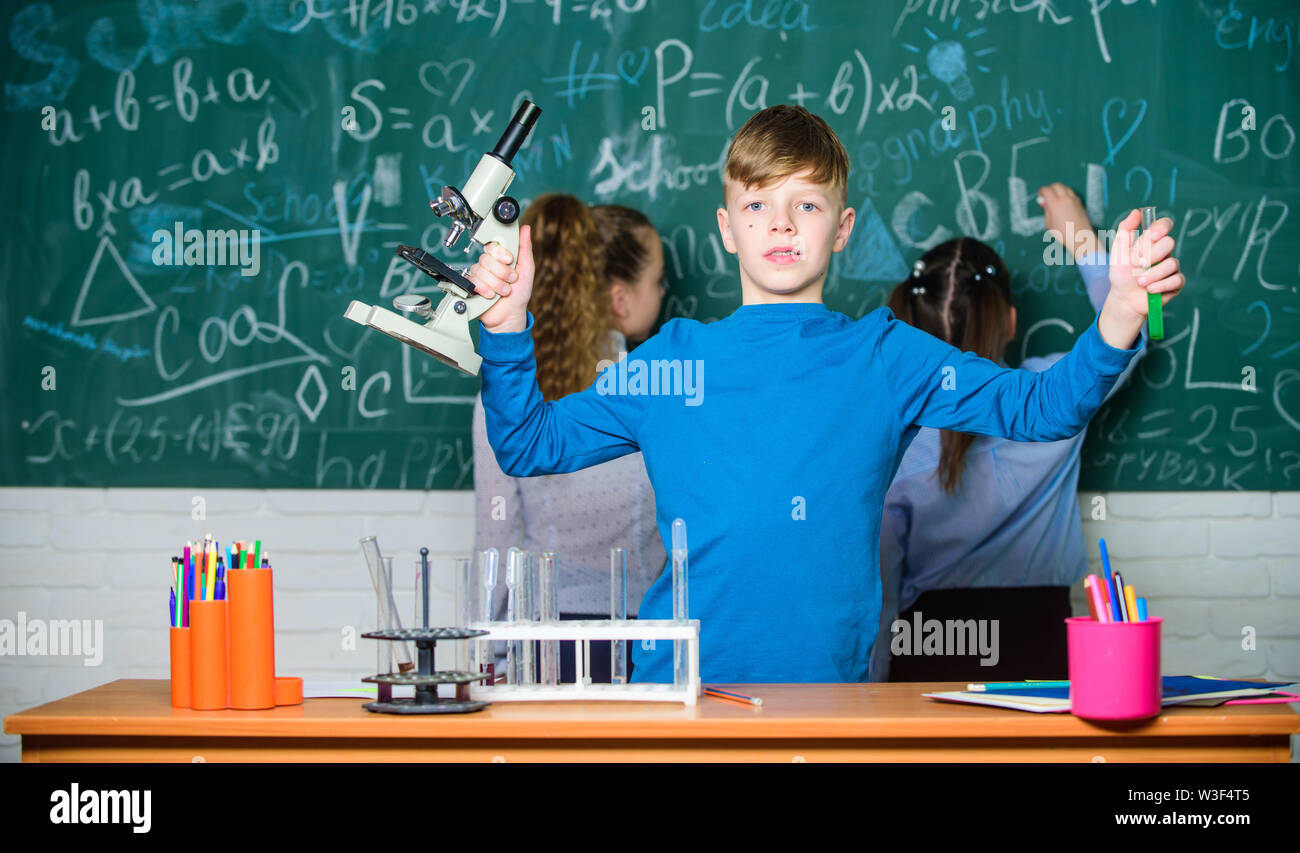 Kids study biology and chemistry in school. School education. Own ...