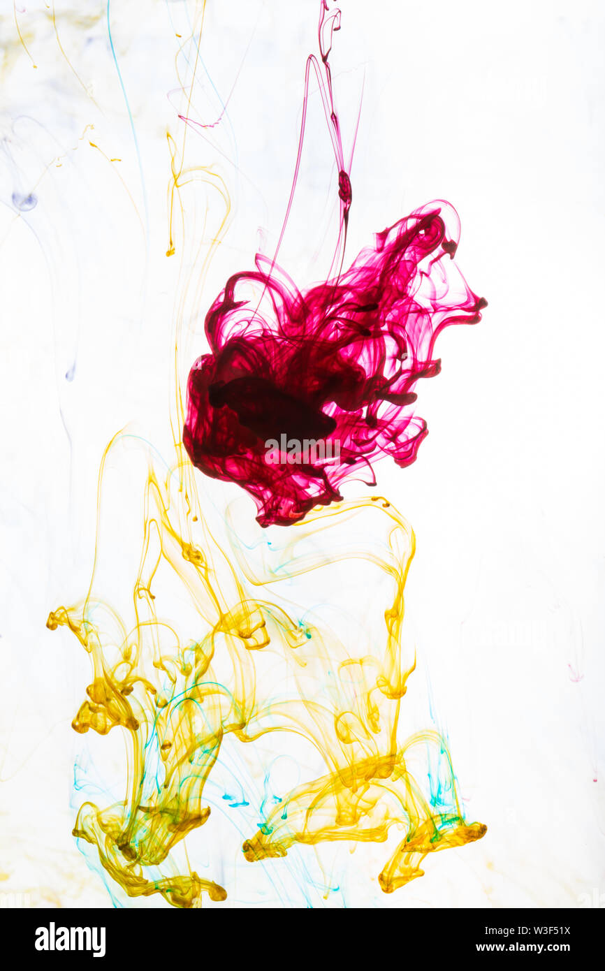 Acrylic colors and ink in water. Abstract background Stock Photo - Alamy