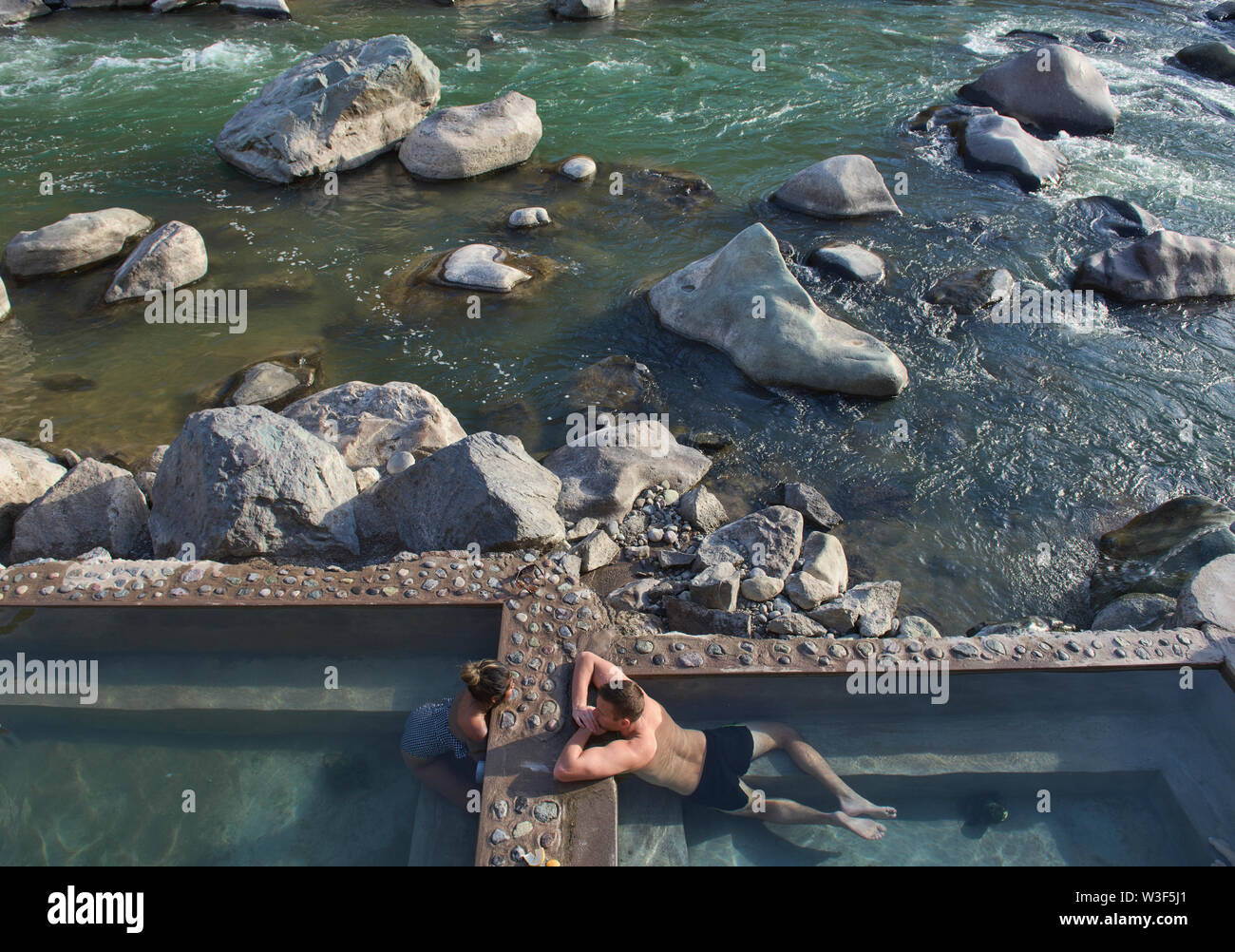 Enjoying hot springs on the Colca River at Llahuar, Colca Canyon, Peru ...