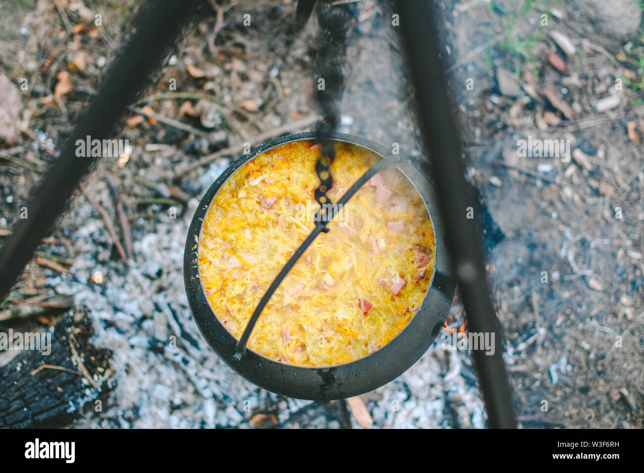 Cooking cabbage soup on a bonfire Stock Photo - Alamy