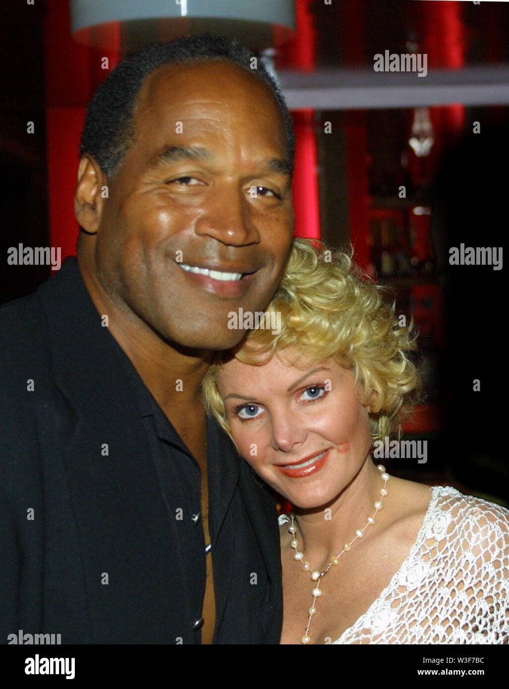 OJ Simpson and friend Tammy Wu 2002Photo By Adam ScullPhotoLink ...