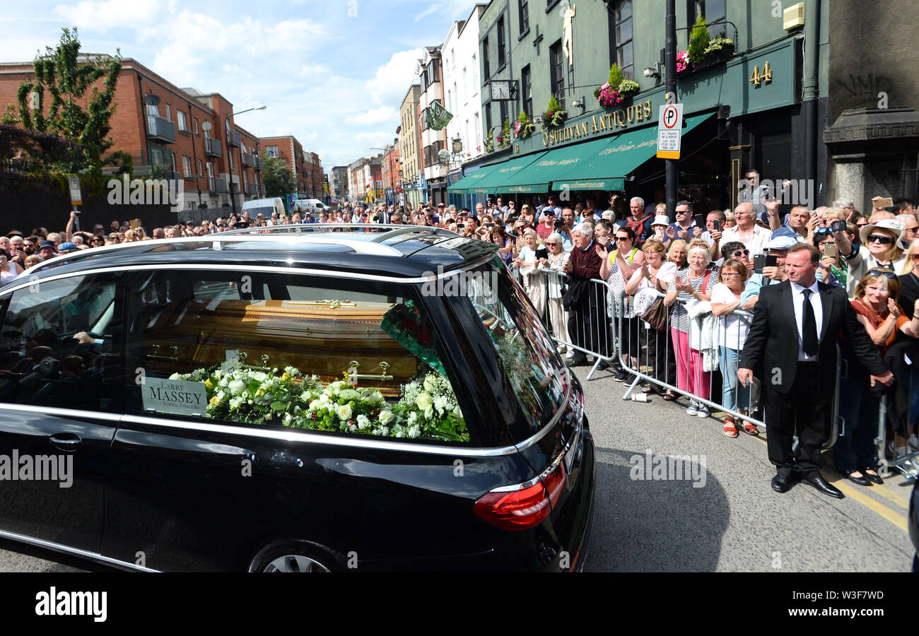 The coffin of Father Ted star Brendan Grace is carried by a hearse ...