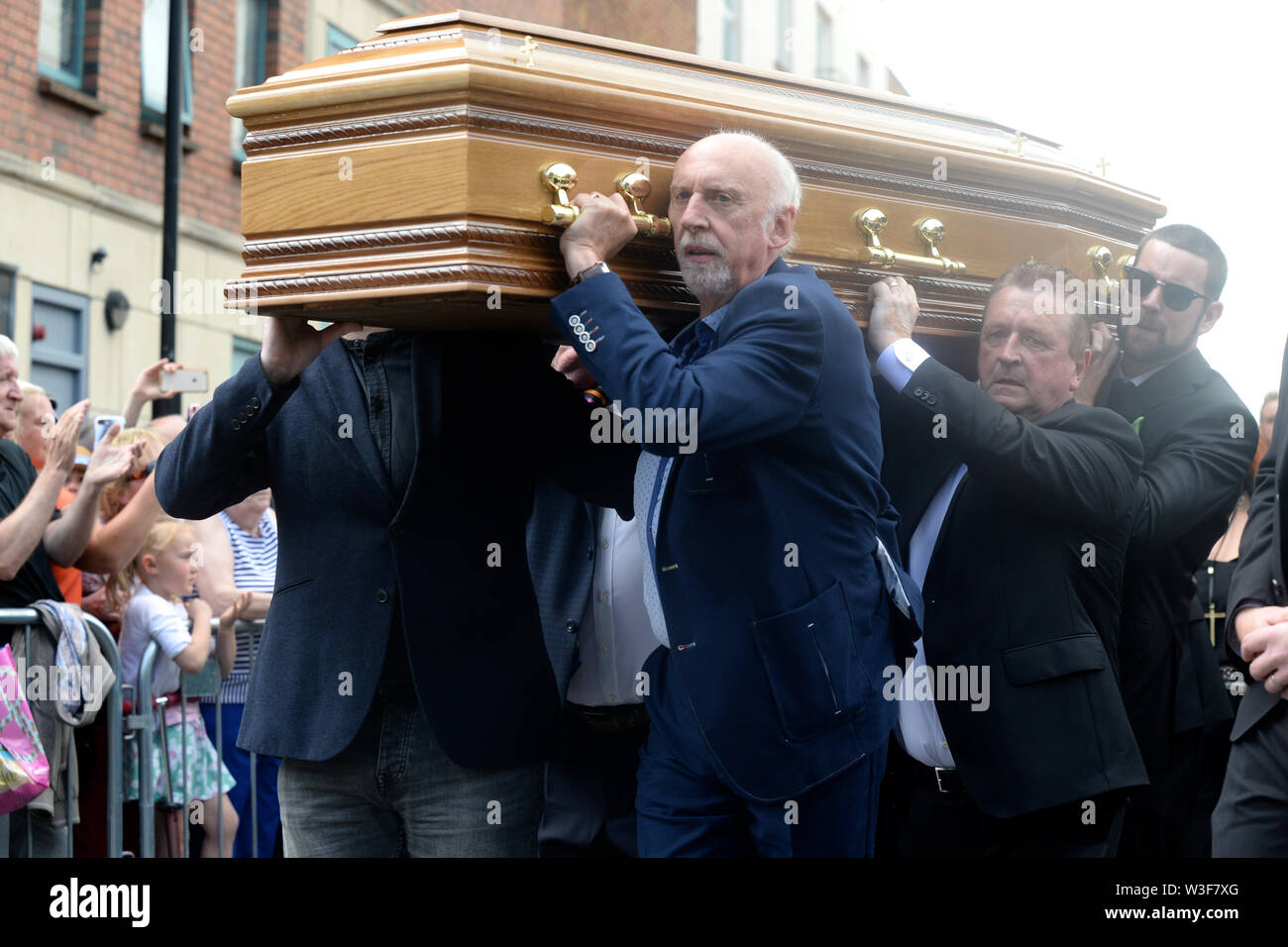 The coffin of Father Ted star Brendan Grace is carried into the Church ...