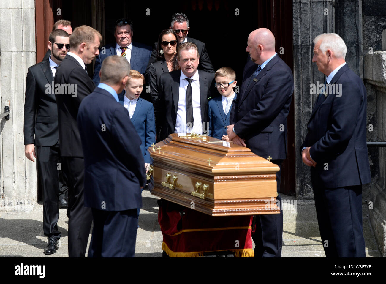 The coffin of Father Ted star Brendan Grace outside the Church of St ...