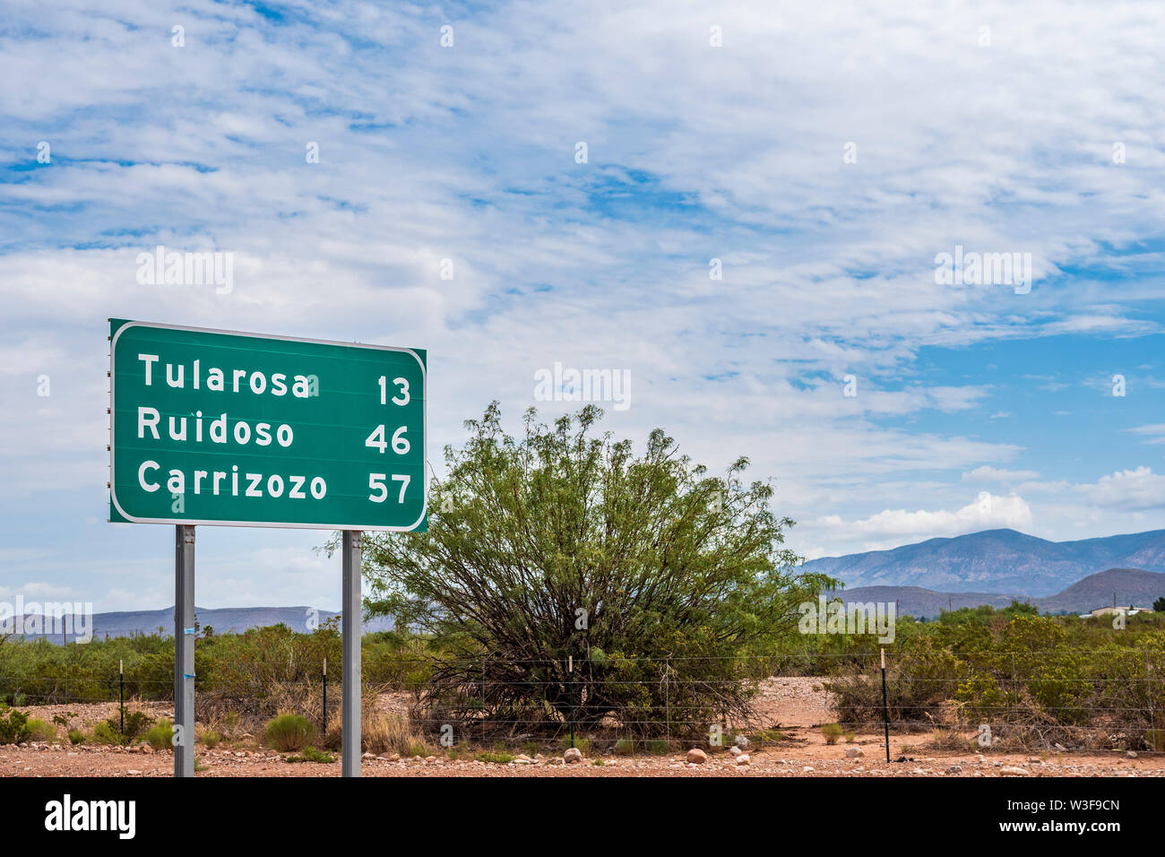 New Mexico highway mileage road sign on Highway 54 Stock Photo - Alamy