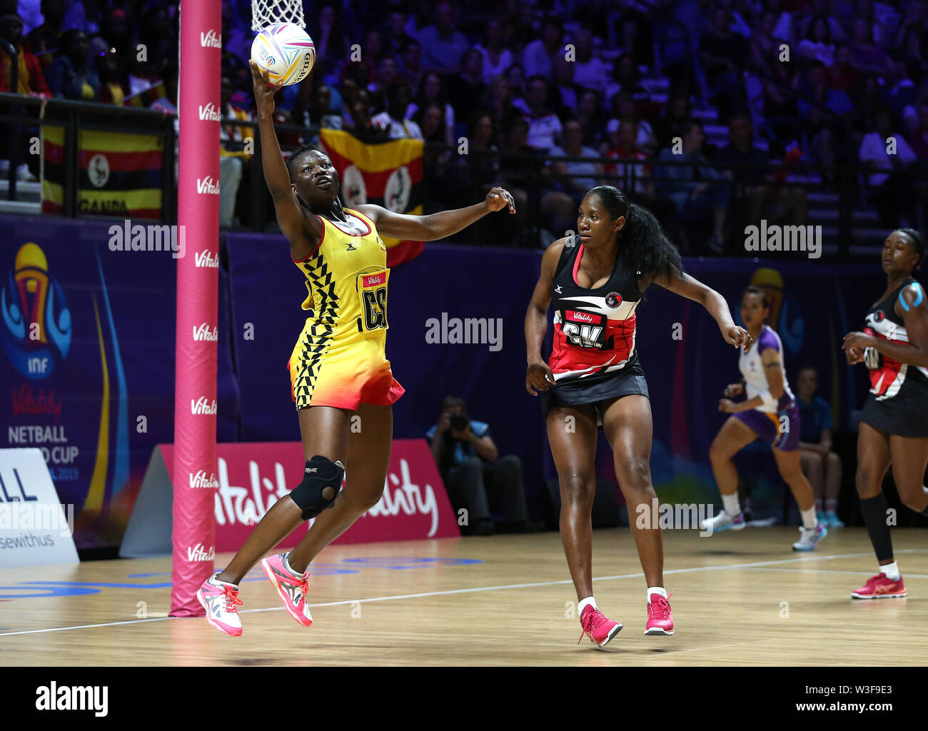 Uganda's Peace Proscovia (left) and Trinidad and Tobago's Daystar Swift ...