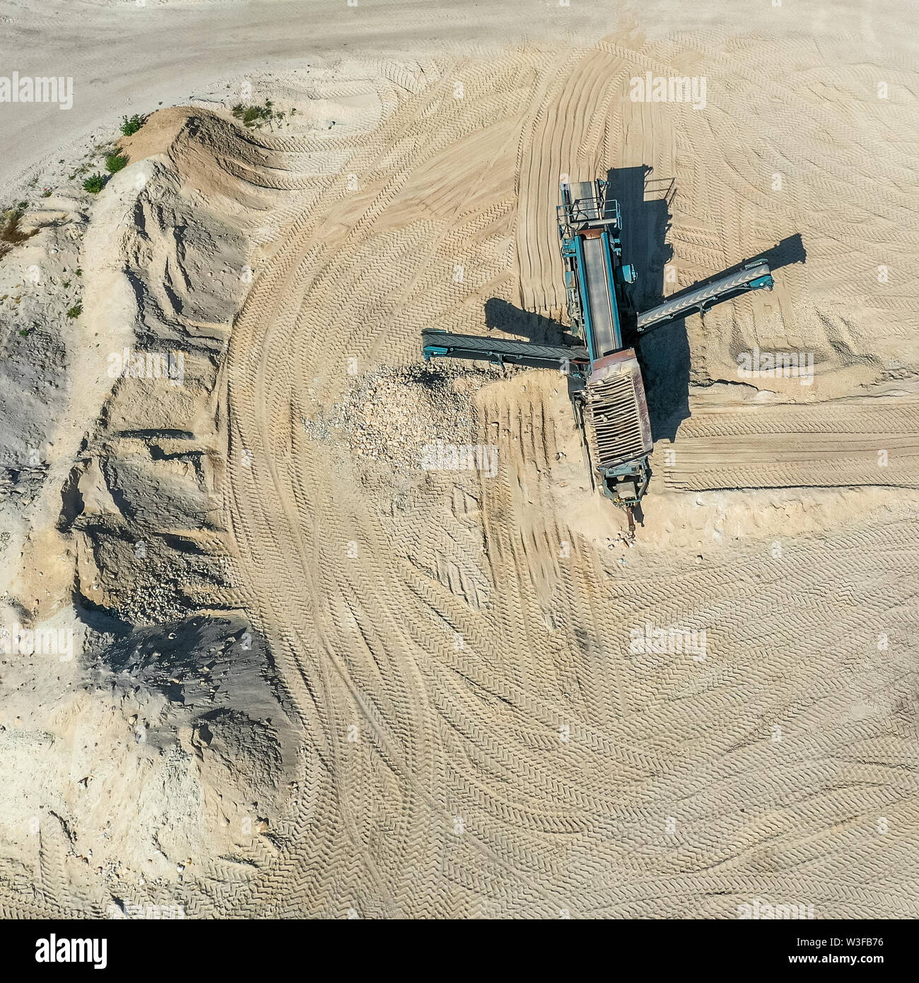 Aerial view of the processing machine, the extractor, in a sand quarry ...