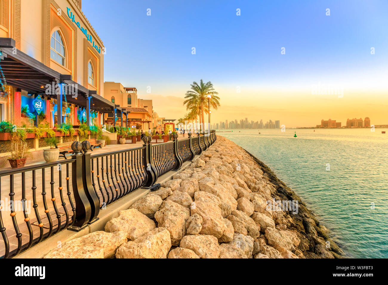 Doha, Qatar - February 18, 2019: amazing sunset in marina walkway ...