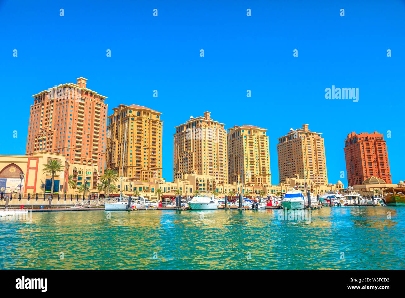 Doha, Qatar - February 18, 2019: sea view of marina waterfront, popular ...