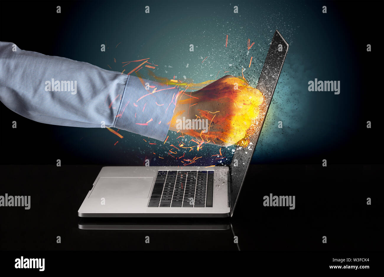 Arm hitting strongly laptop screen which breaks in little pieces Stock ...
