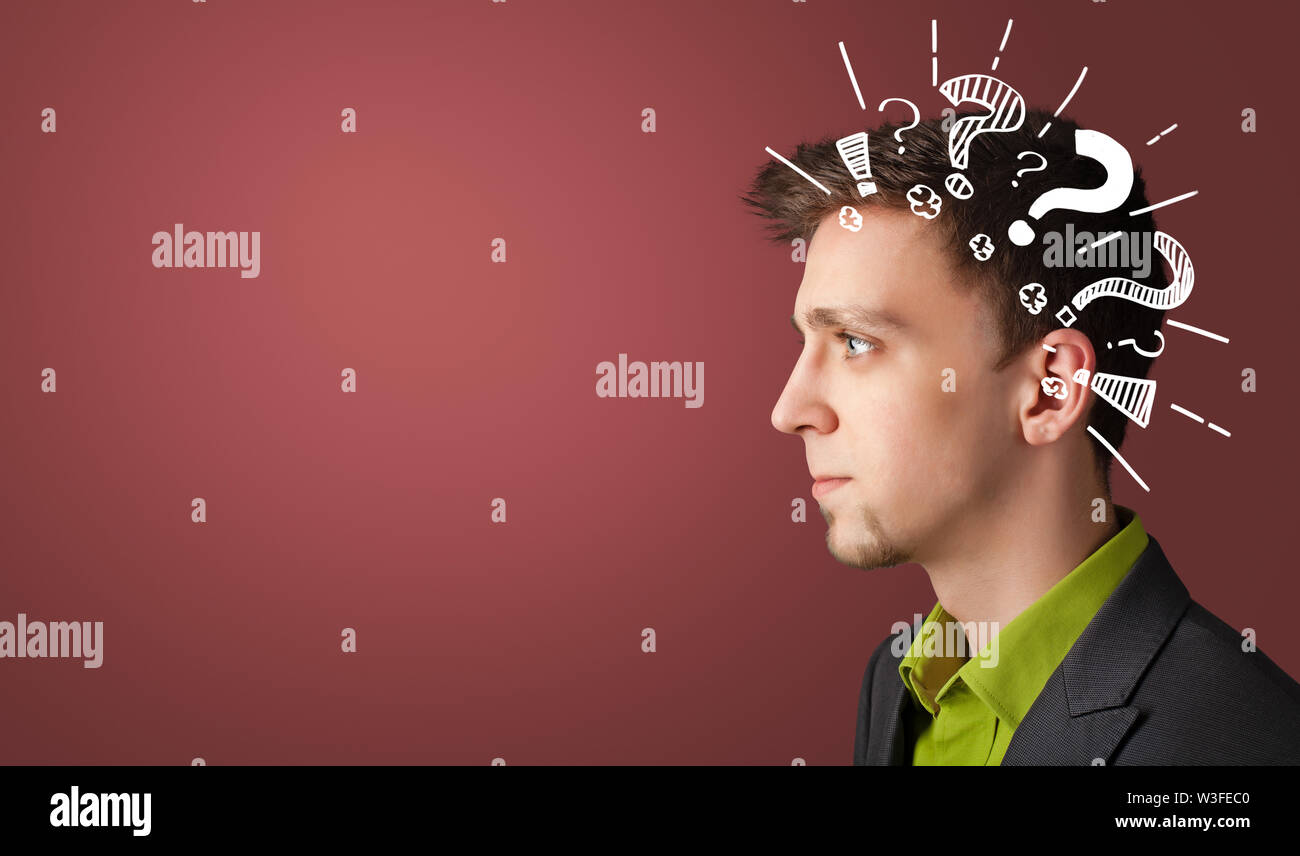 Head with white question marks, and copy space Stock Photo - Alamy
