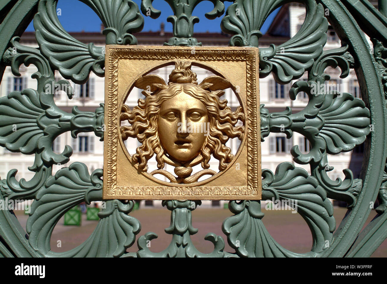 Turin, Pedmont, Italy close up the gate of the Royal Palace with golden ...
