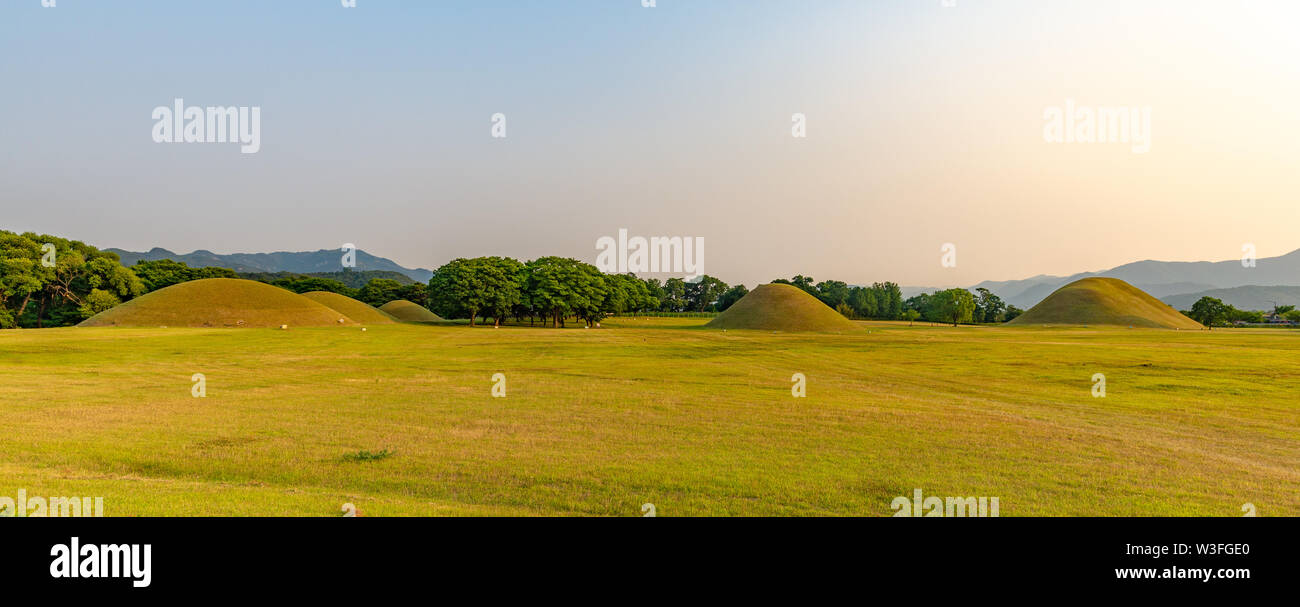 Panoramic view on the famous Daereungwon Tombs complex taken at sunset ...