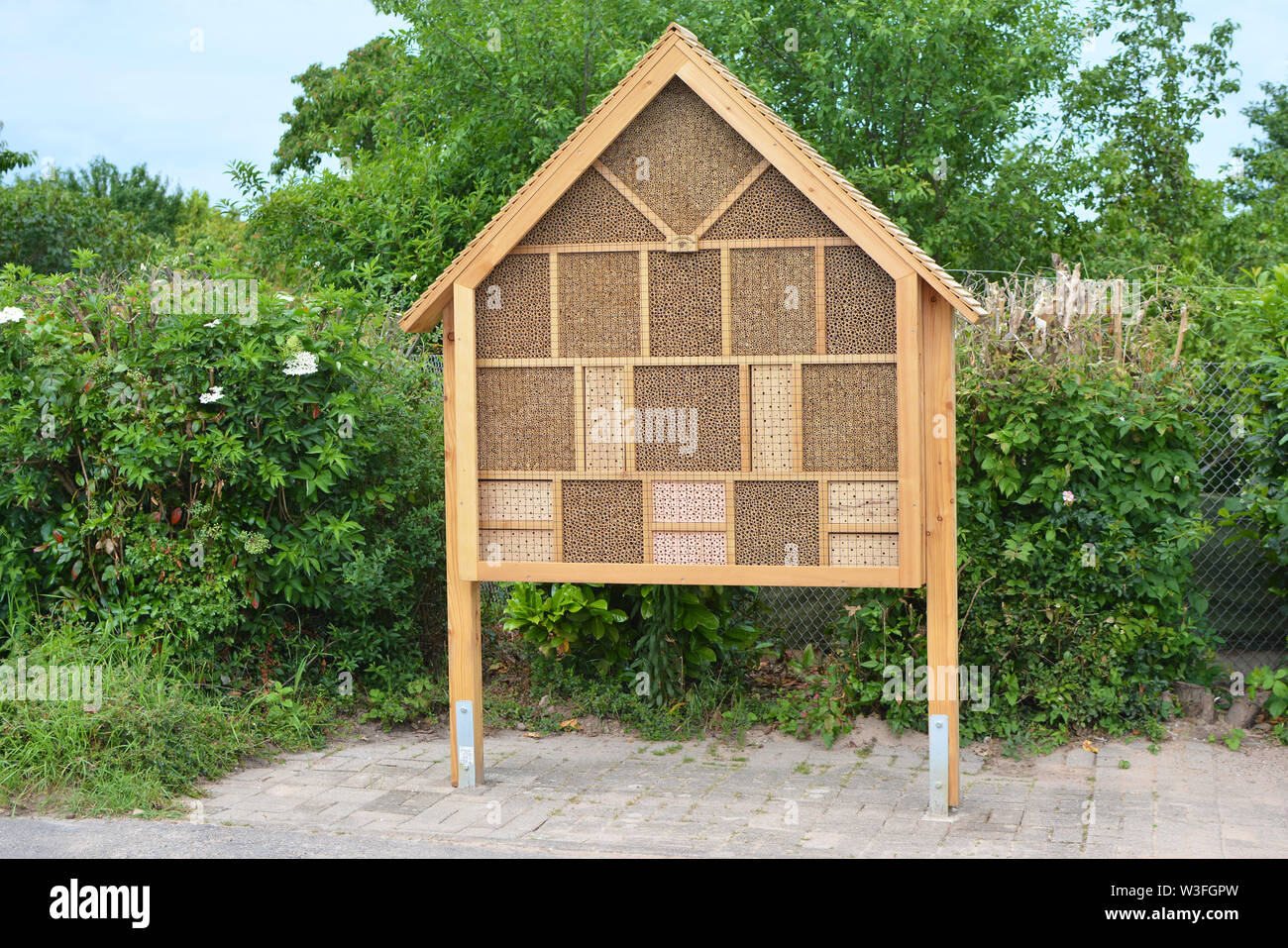 Big wood insect house hotel structure created to provide shelter for ...